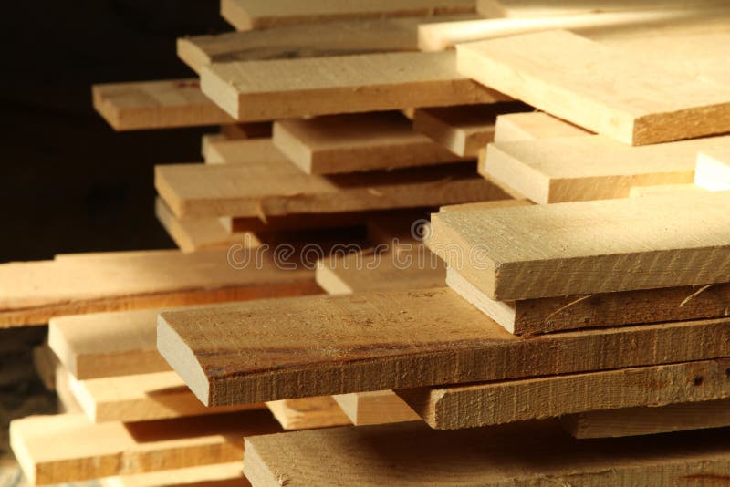 Cut lumber boards on side stock image. Image of ownership - 70298257