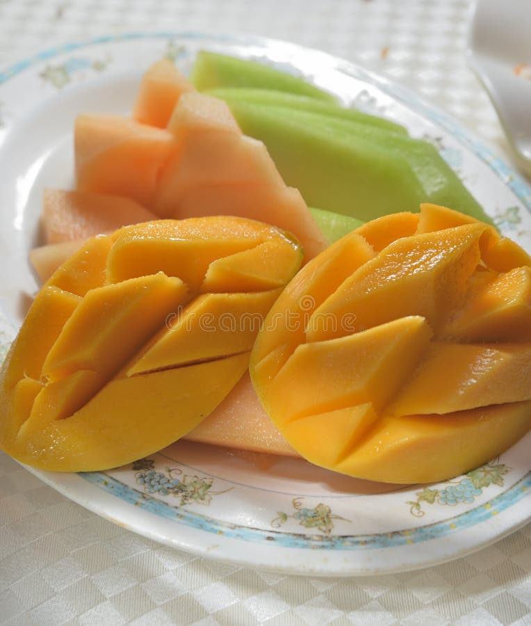 Mango honey melon platter stock image. Image of tomato - 129415625