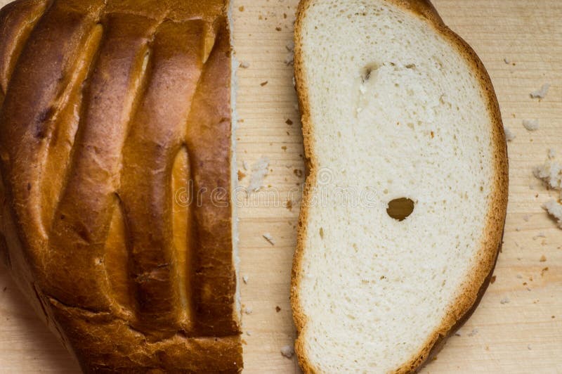 Cut Off a Piece of Loaf Bread Stock Photo - Image of food, bread: 58427238