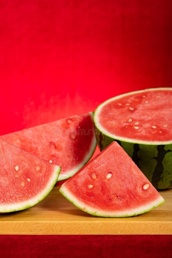 Cut Out Fresh Watermelon on Red Vertical Composition Stock Image ...