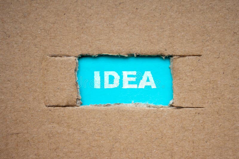 A Cut-out Hole in the Paper Cardboard, and Under it a Piece of Paper ...