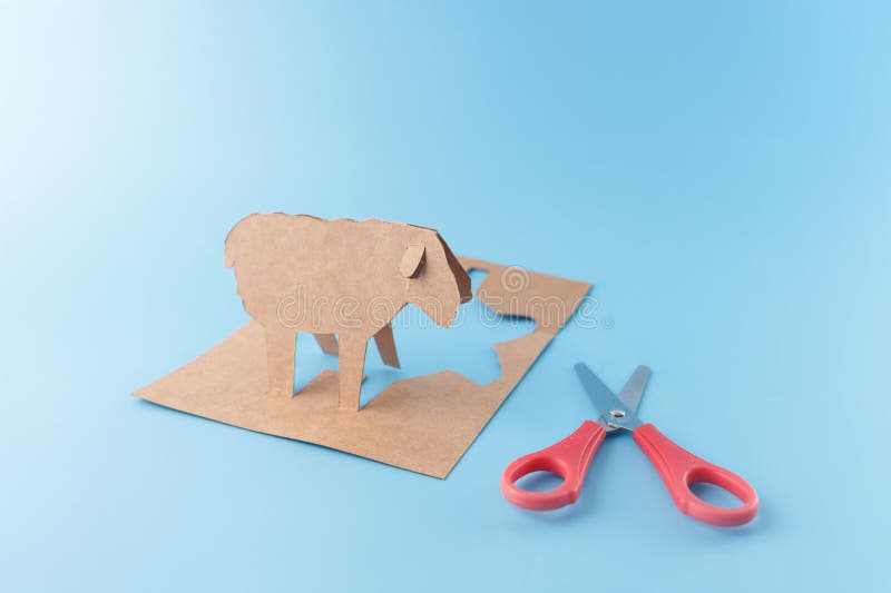 Cut Out the Sheep Shape with Scissors As Part of Simple Craft Project ...