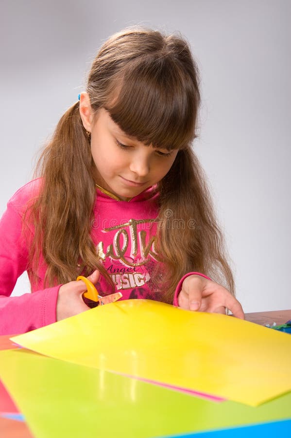 Cut paper figures stock image. Image of activity, scissors - 12682325