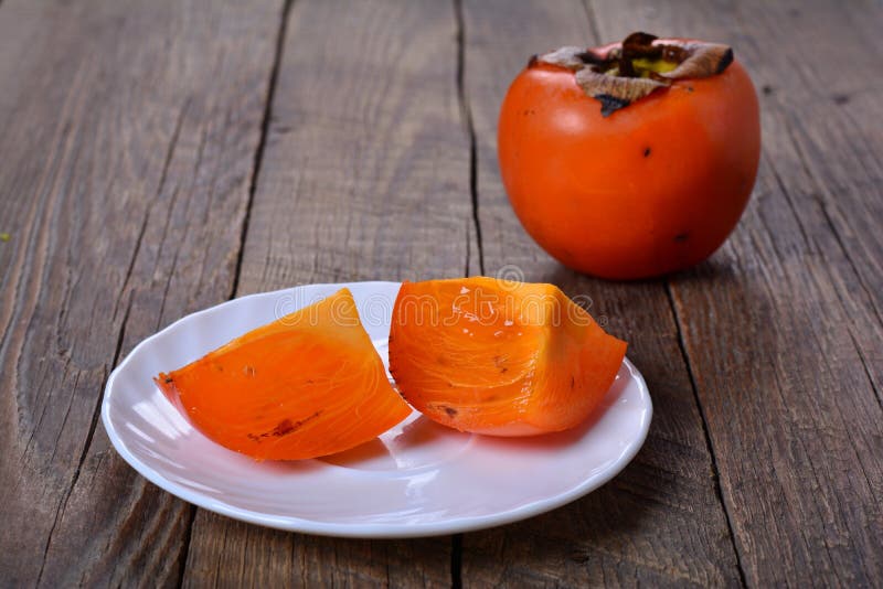 Cut persimmon stock image. Image of fructose, color, astringent - 63011165