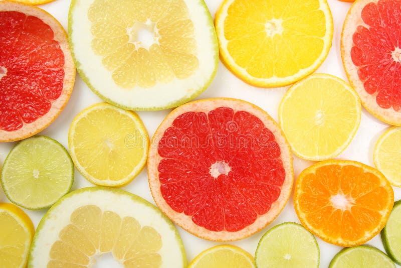 Cut Pieces of Different Citrus Fruits on White Background Stock Image ...