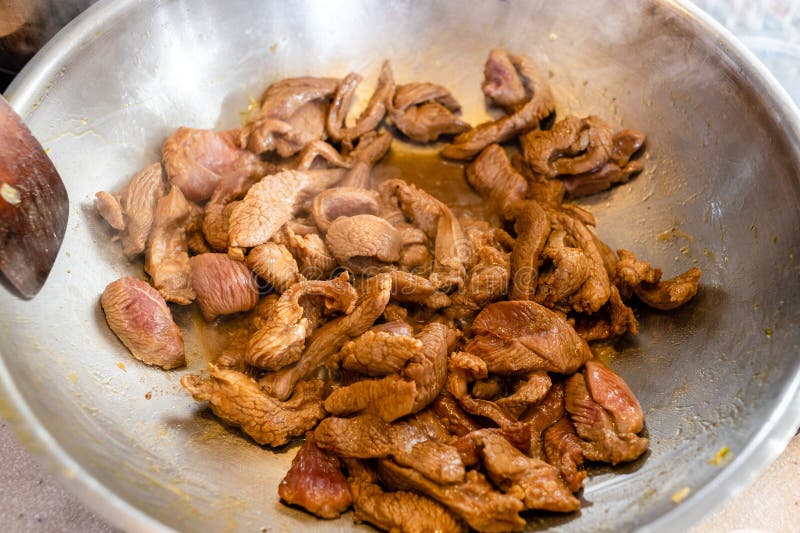 Cut into Pieces Turkey Fillet is Fried in Wok Stock Photo - Image of ...