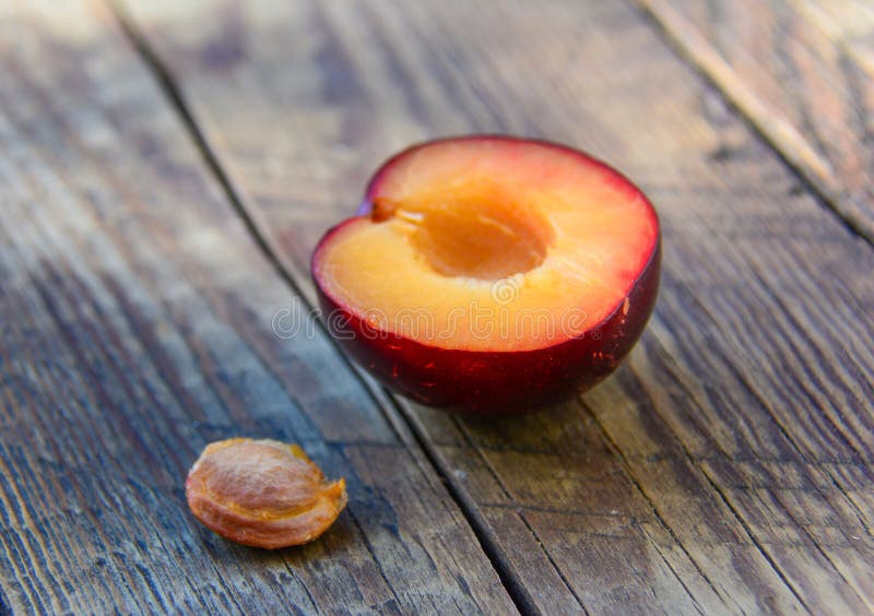 Cut plum fruit stock photo. Image of table, plum, gardening - 57135666