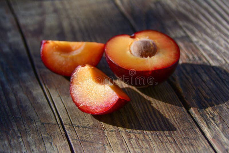 Cut plum fruit stock image. Image of tasty, agriculture - 57136435