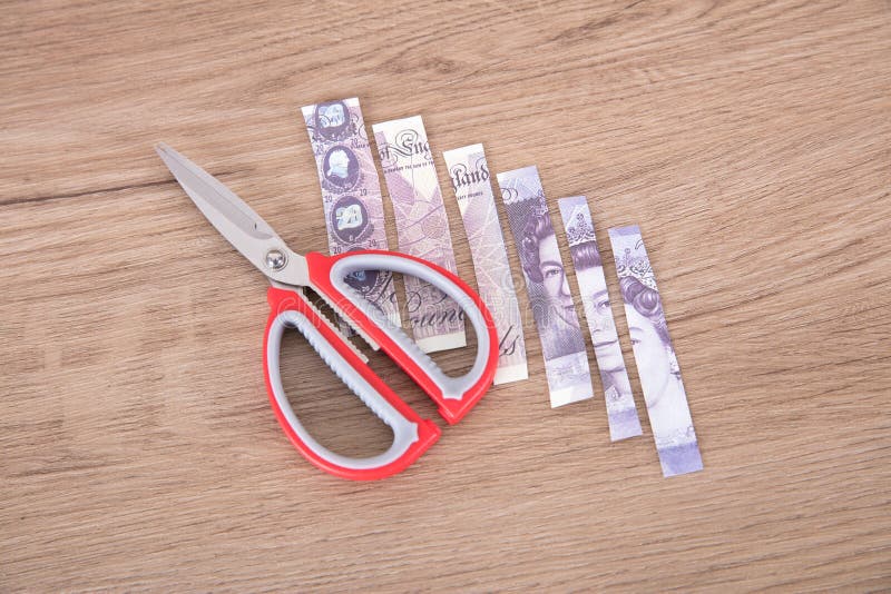 Cut Pound Sterling Banknotes and Scissors Editorial Photo - Image of ...