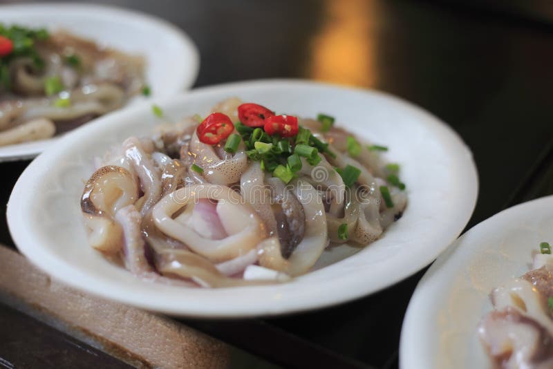 Cut raw calamari rings stock photo. Image of cooking - 36908176