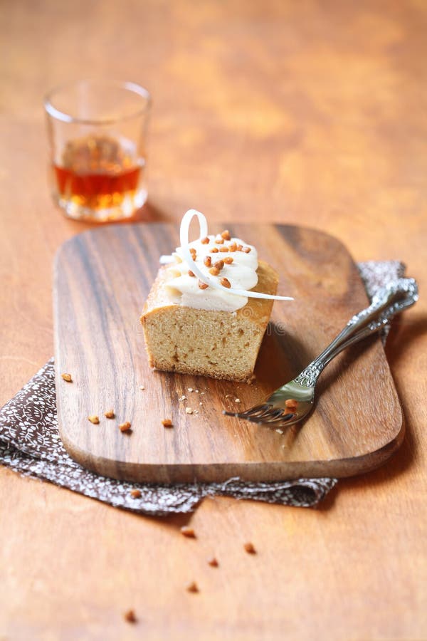 Cut of Rectangular Cake with White Chocolate Cream Cheese Frosting ...