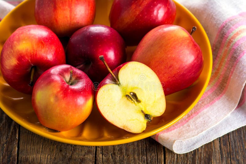 Cut red apple stock photo. Image of healthy, crisp, appetising - 65425488