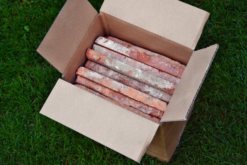 Cut Red Bricks Range in Cardboard Box Stock Image - Image of ...