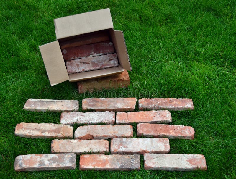 Cut Red Bricks Range in Cardboard Box Stock Image - Image of building ...