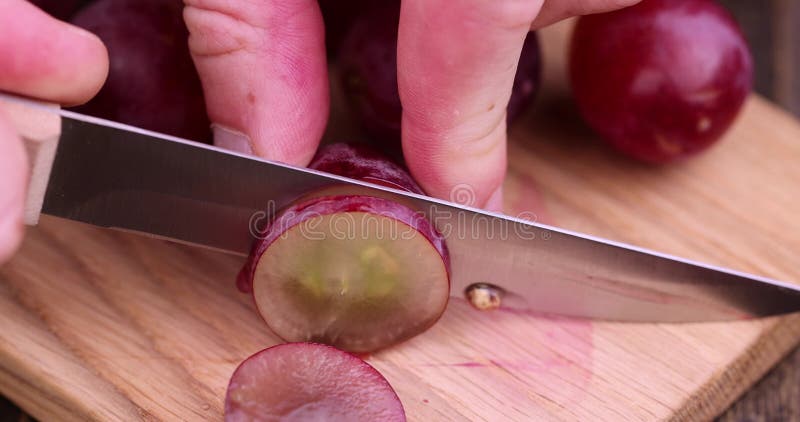 Cut the Red Grape Berry on the Table Stock Footage - Video of berry ...