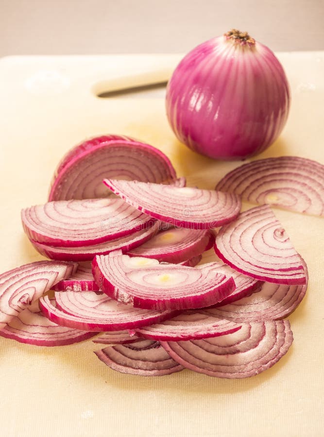 Cut Red Onion on a White Board Stock Image - Image of kitchen ...