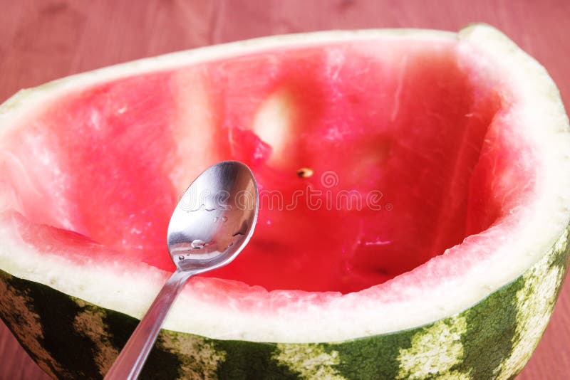 Cut Red Watermelon on the Edge of Which is a Spoon. Watermelon Was ...