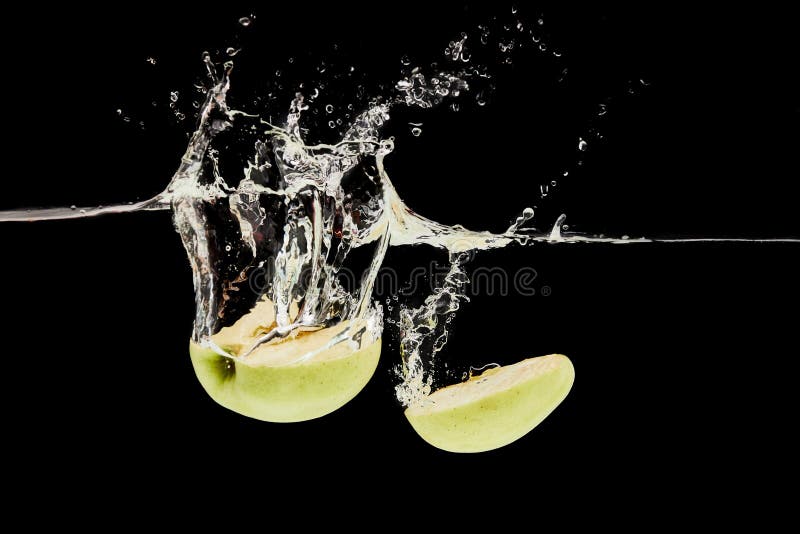 Ripe Apple Falling Deep in Water Stock Photo - Image of apple, halves ...