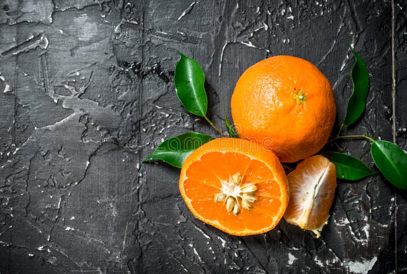 Cut Ripe Mandarin with Leaves Stock Photo - Image of orange, nature ...