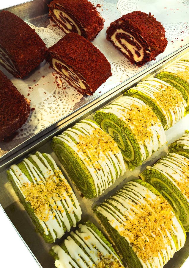 Cut roll cakes at sale stock photo. Image of group, gastronomy - 209546646