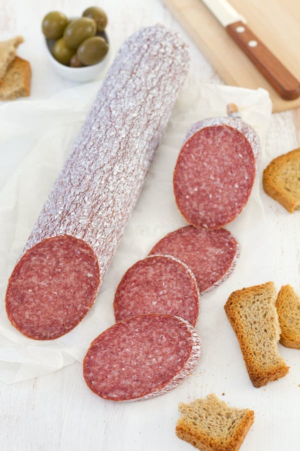 Cut salami with olives stock image. Image of olive, appetizer - 27040837