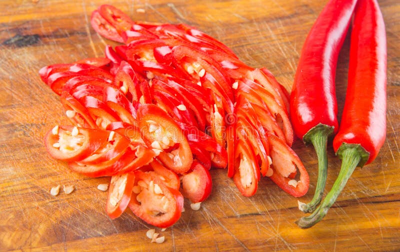 Cut Slices of Red Chili on Cutting Board VI Stock Photo - Image of ...
