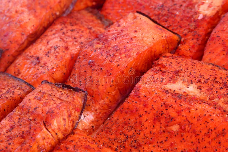 Cut Slices of Red Fish Fillet with Pepper on the Counter Stock Photo ...