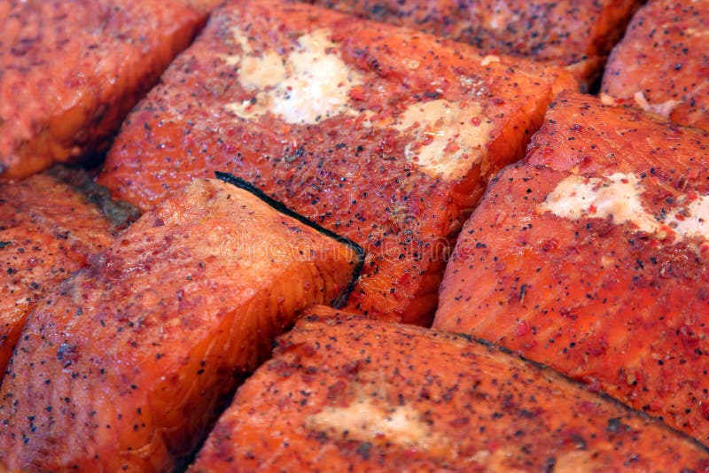 Cut Slices of Red Fish Fillet with Pepper on the Counter Stock Photo ...