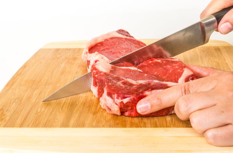 Cut the steak stock photo. Image of hand, cutting, knife - 58026208