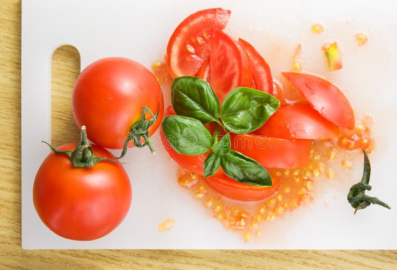 Cut tomatoes stock image. Image of table, close, preparation - 9627489