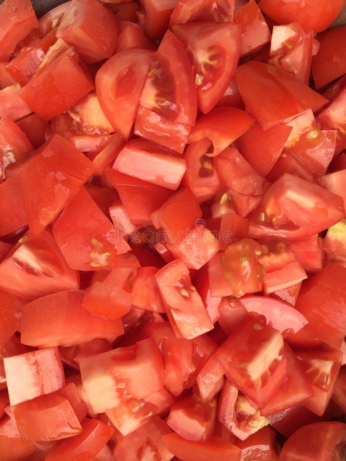 Cut tomatoes stock photo. Image of tomato, frame, diced - 77520824