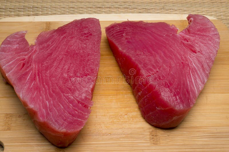 Cut Tuna Fish on a Cutting Board Stock Image - Image of tuna, fillet ...