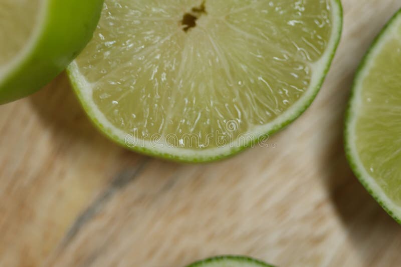 Cut Up Lime on the Cutting Board Stock Photo - Image of dish, table ...
