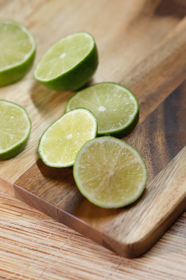 Cut Up Lime on the Cutting Board Stock Photo - Image of cutting ...