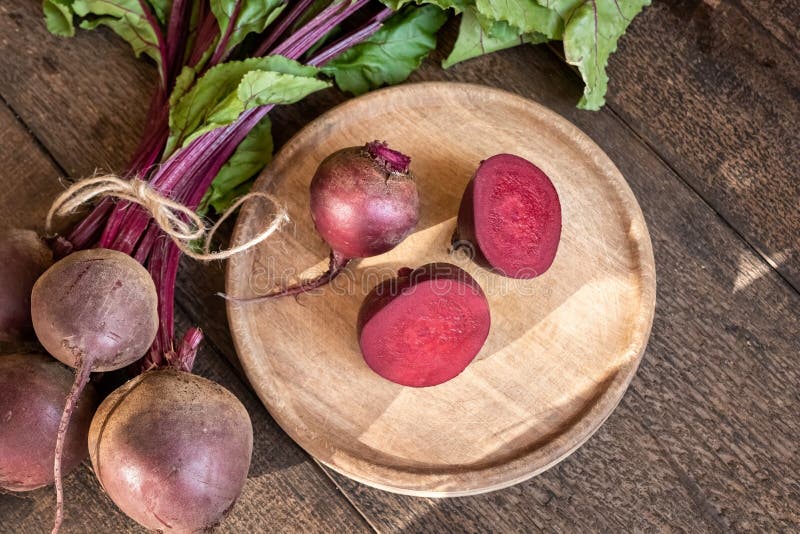 Cut Up Red Beets with Leaves on a Table Stock Photo - Image of cutting ...