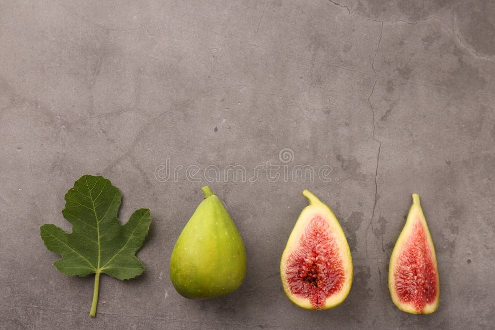 Cut and Whole Green Figs with Leaf on Light Gray Table, Flat Lay. Space ...