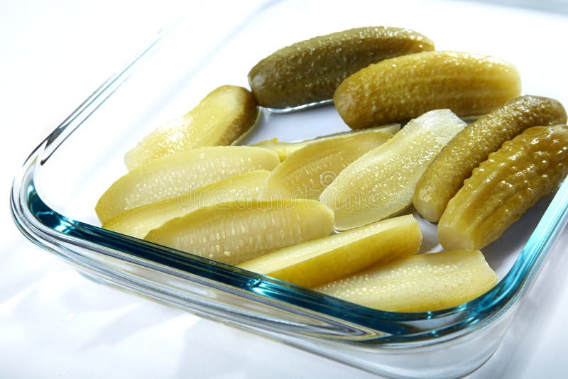 The cut and whole pickles stock image. Image of closeup - 12728017