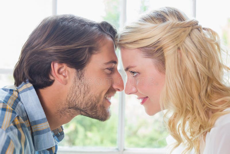 Cute Affectionate Couple Facing Each Other Stock Photo - Image of ...