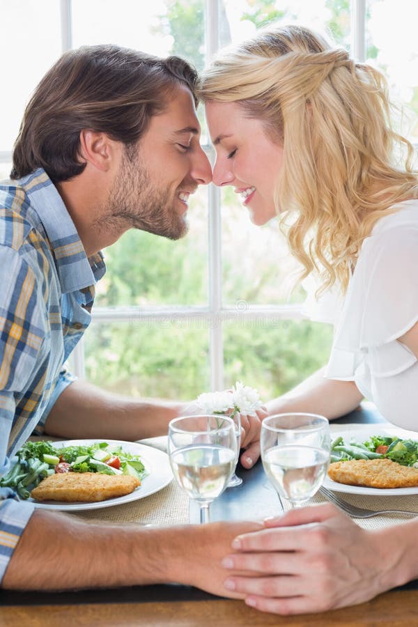 Cute Affectionate Couple Having a Meal Together Stock Image - Image of ...