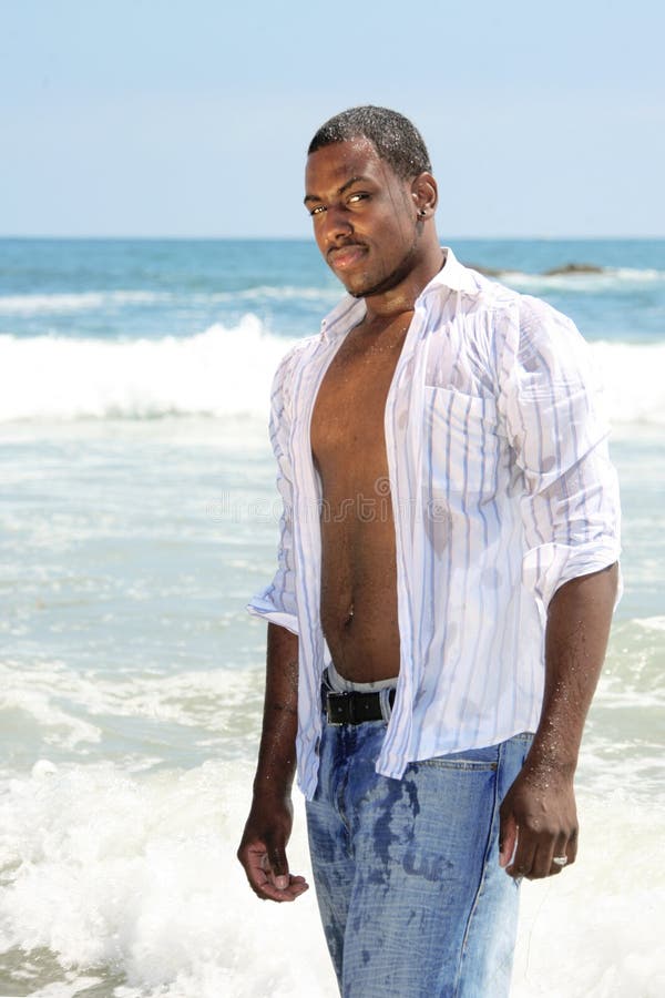 Cute African American Young Male Standing in Wate Stock Image - Image ...