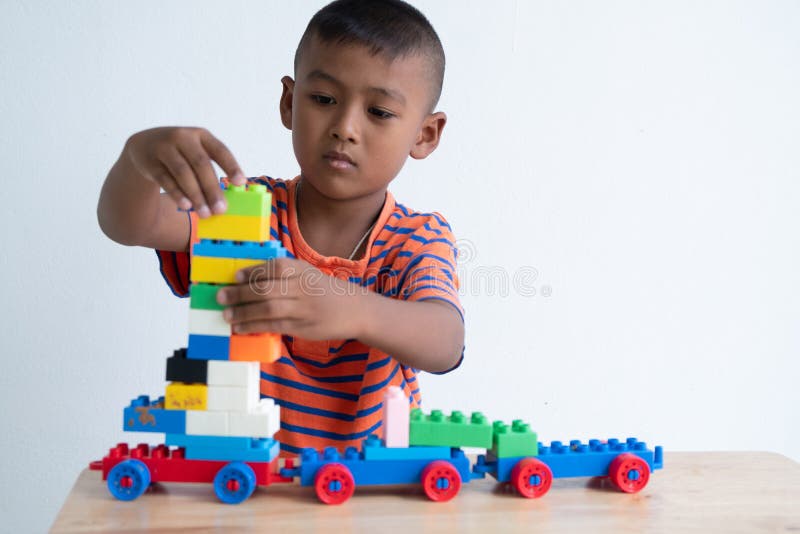 Cute Asian Boy Play Toy in Room Stock Photo - Image of caucasian, child ...