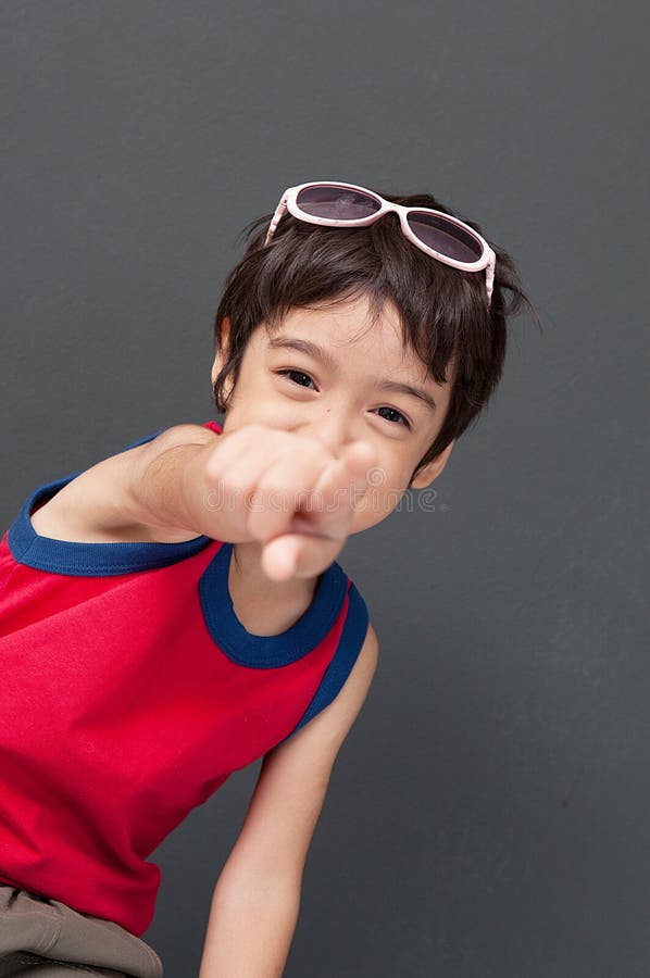 Cute Asian boy pointing stock photo. Image of children - 32826234