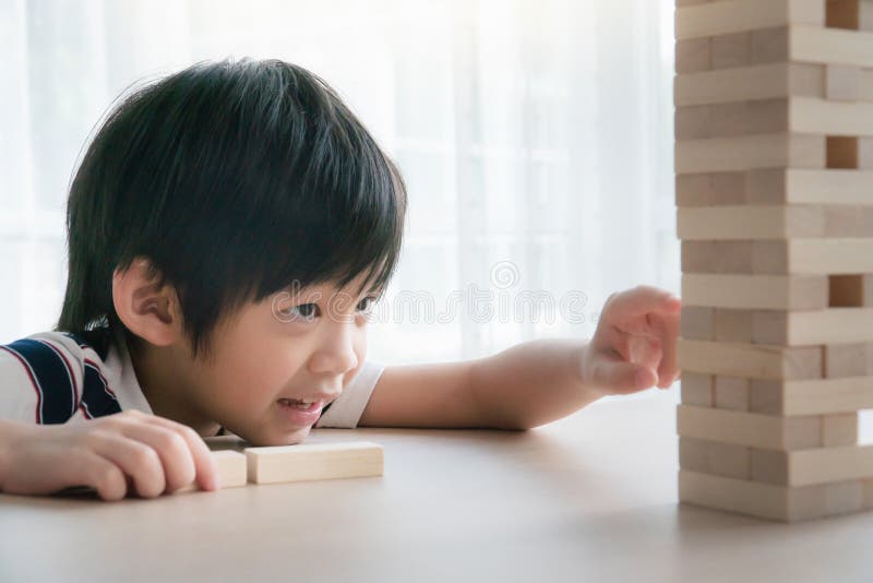 Asian Child Playing Wood Blocks Stack Game Stock Image - Image of ...