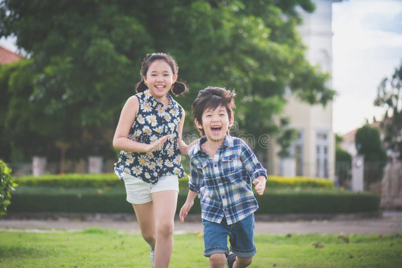 Cute Asian Children Runing Together Stock Photo - Image of korea, japan ...