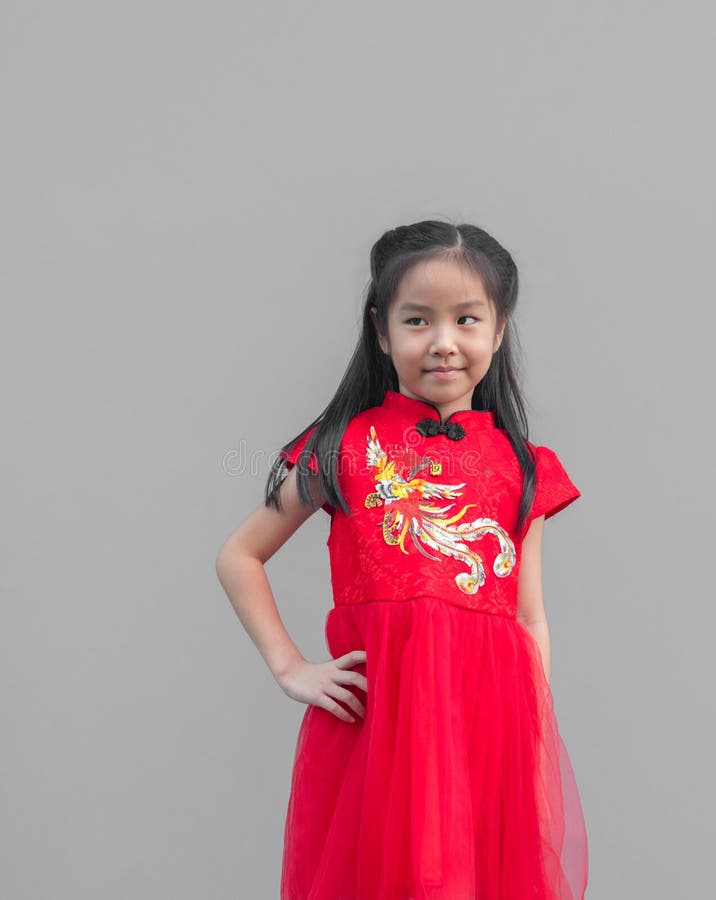 Cute Asian Girl In Chinese Cheongsam And Tradition Chinese Dress With