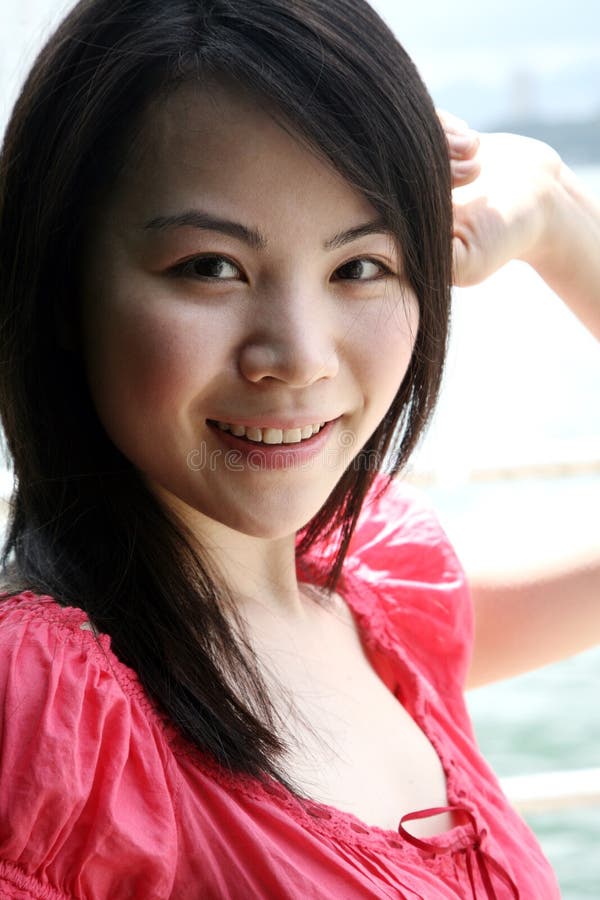 Cute Asian Girl Looking at the Viewer Stock Photo - Image of radiant ...