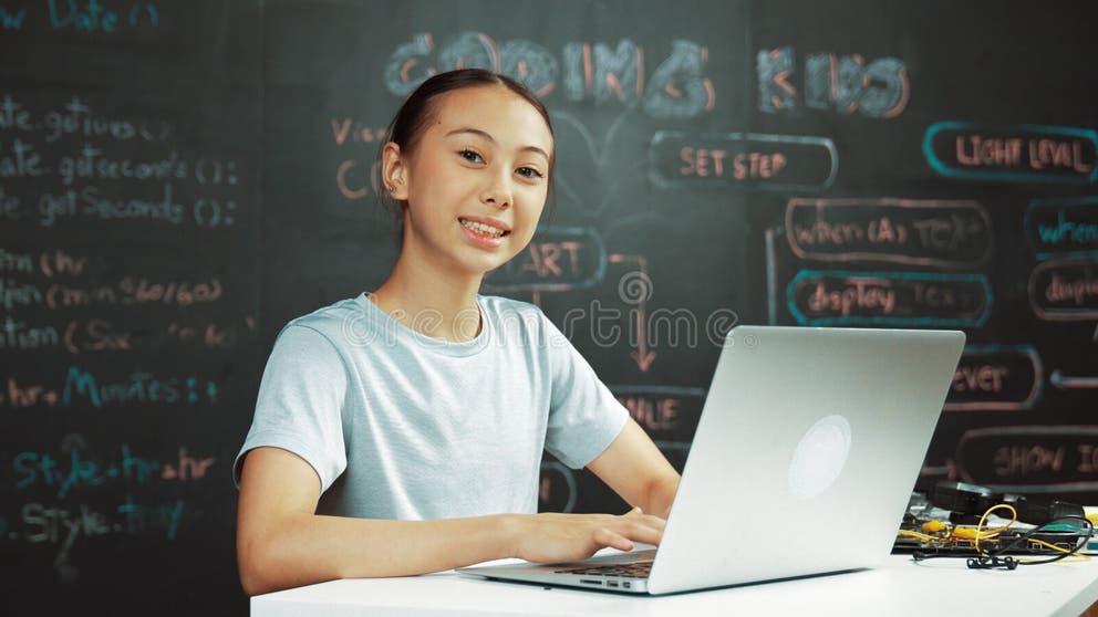 Cute Asian Girl Programing System by Using Laptop at Blackboard ...