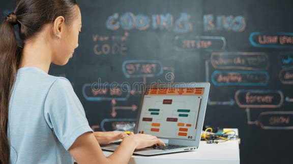 Cute Asian Girl Programing System by Using Laptop at Blackboard ...