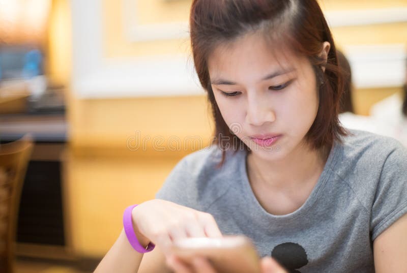 Cute Asian Girl is Using a Mobile Phone Stock Image - Image of business ...
