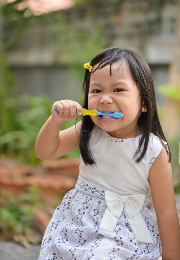Cute Asian Kid Brushing Teeth Stock Photo - Image of teeth, cleaning ...
